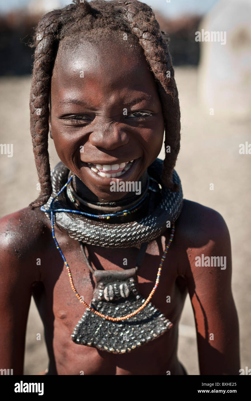 Himba girl in a village near Epupa Falls, Kunene, Namibia, Africa Stock ...