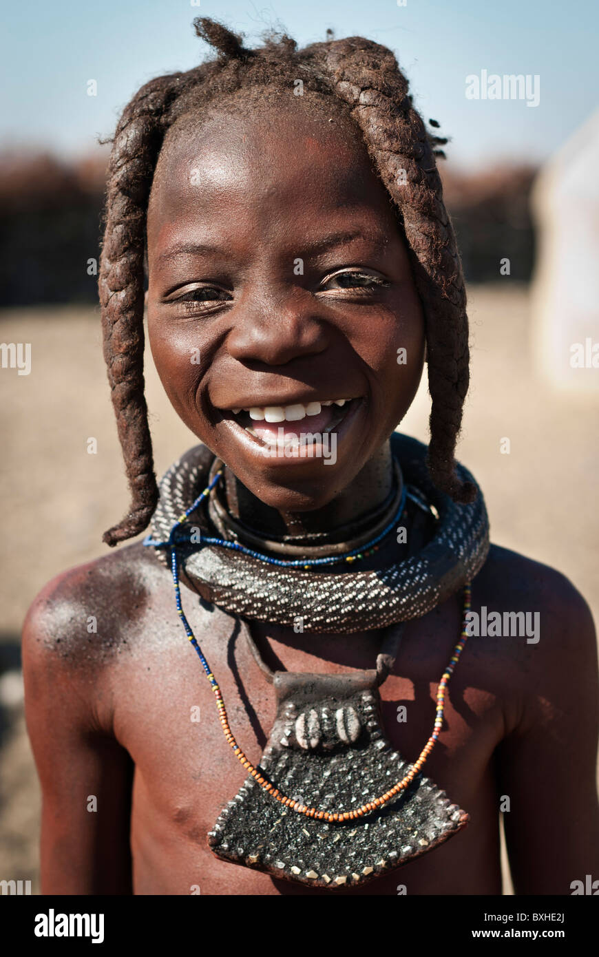 Himba girl in a village near Epupa Falls, Kunene, Namibia, Africa Stock ...