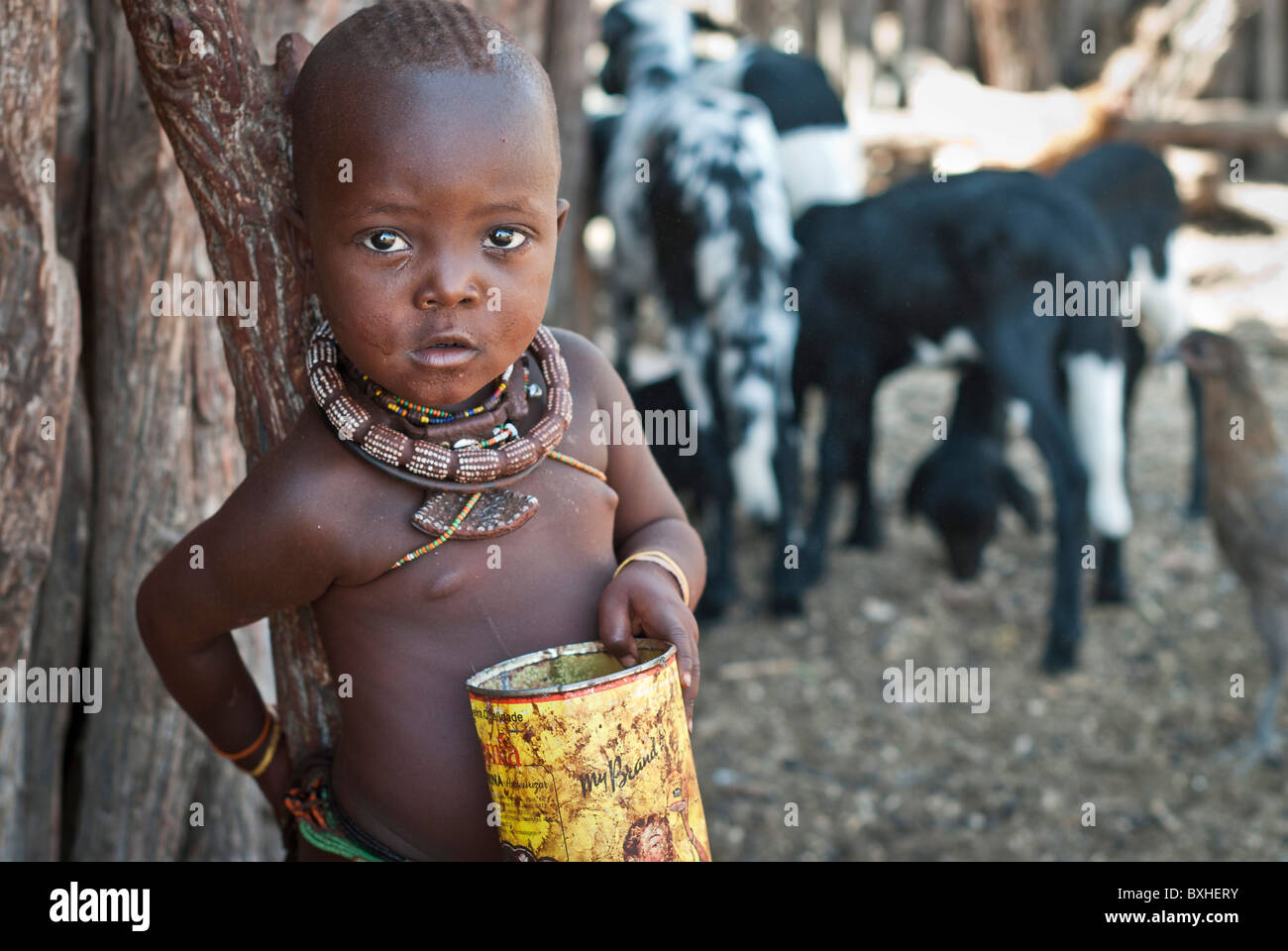 Himba girl in a village near Epupa Falls, Kunene, Namibia, Africa Stock ...