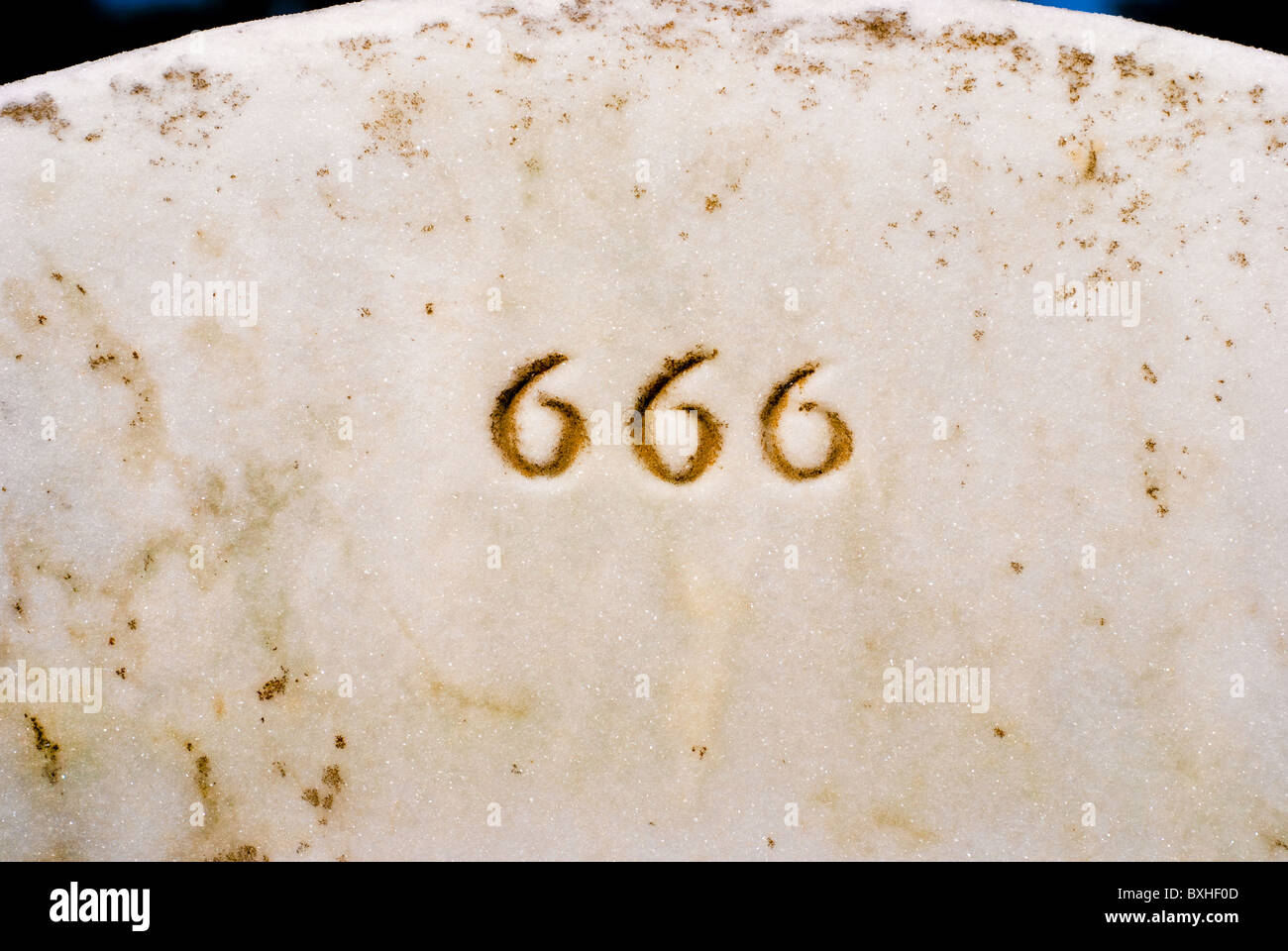 Closeup of 666 engraved in headstone Stock Photo - Alamy