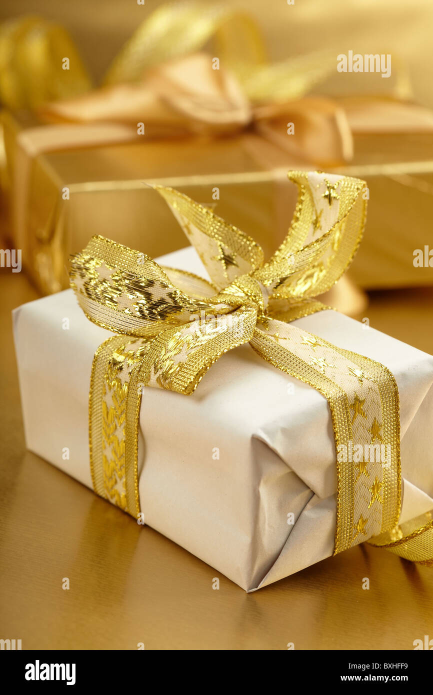 gift box with gold ribbon Stock Photo - Alamy