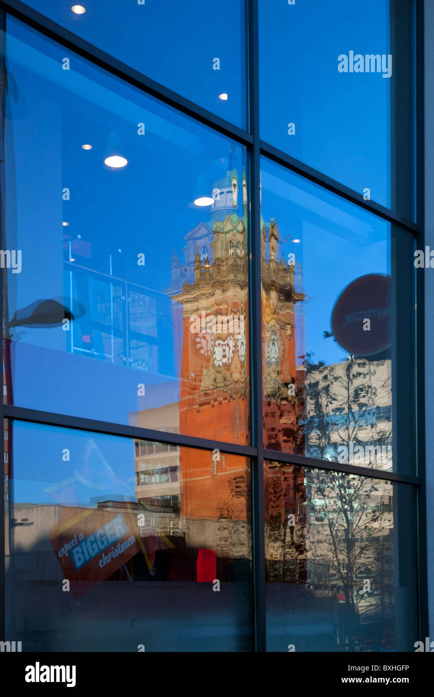 Shops, Shopping, Shoppers, & clock tower window refections in ...