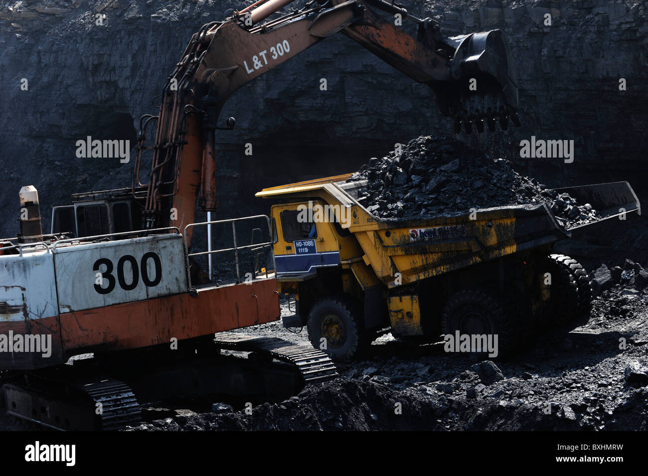 INDIA Jharkand Dhanbad Jharia , opencast hard coal mining of BCCL Ltd , heavy BEML Dumper with ...