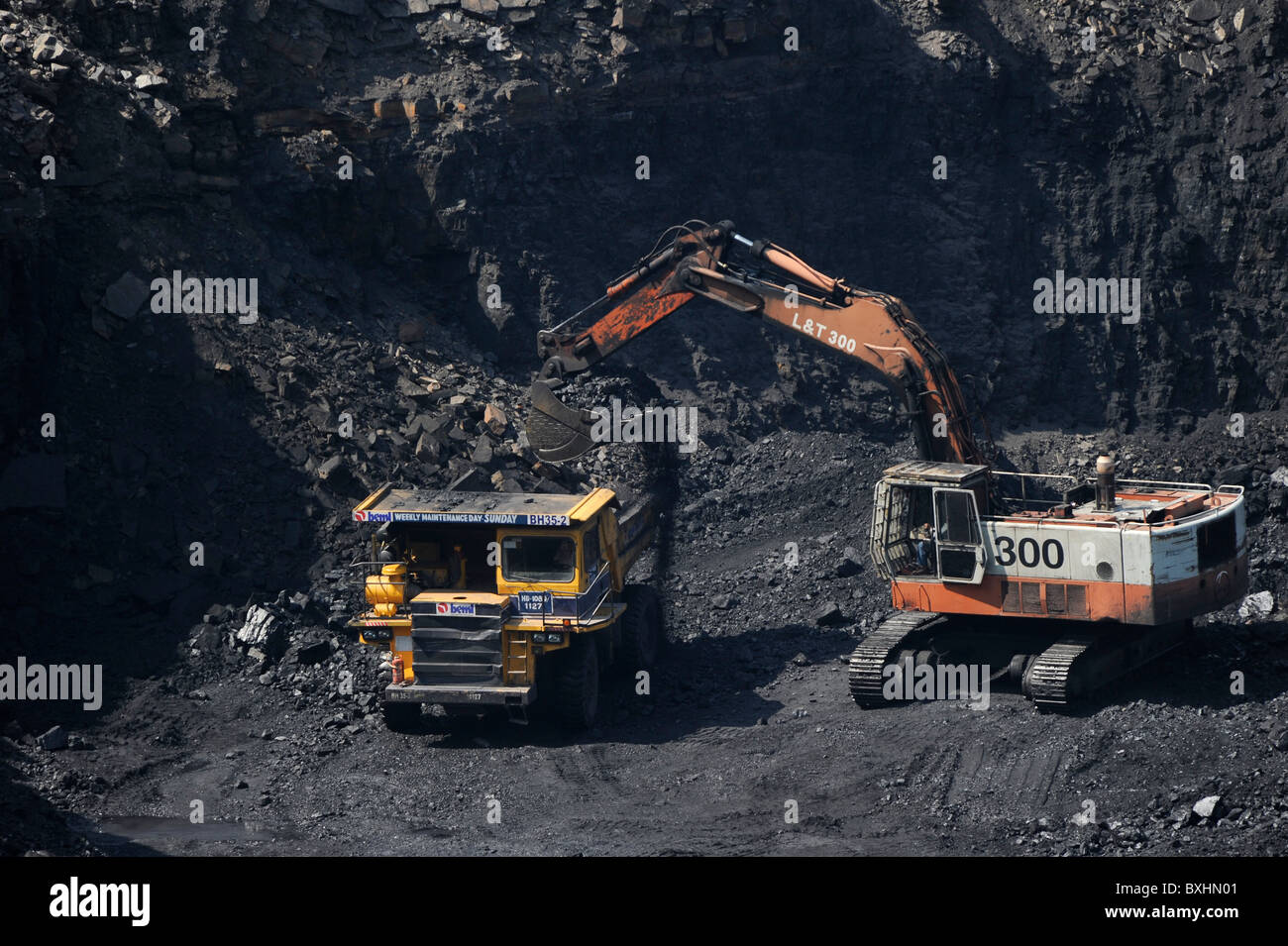 INDIA Jharkand Dhanbad Jharia , opencast hard coal mining of BCCL Ltd , heavy BEML Dumper with ...