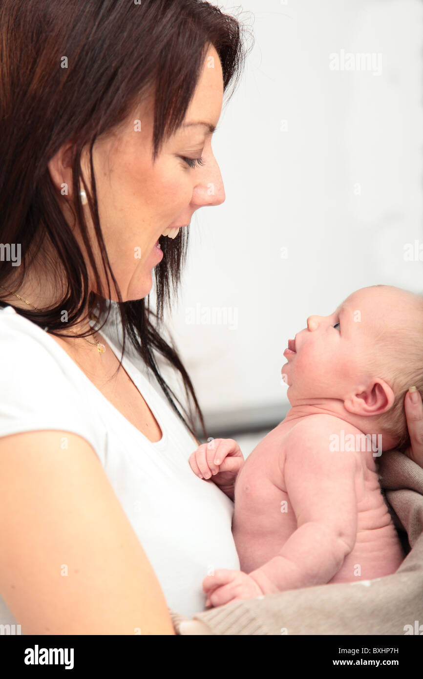 mother and baby with tongue poking out Stock Photo - Alamy