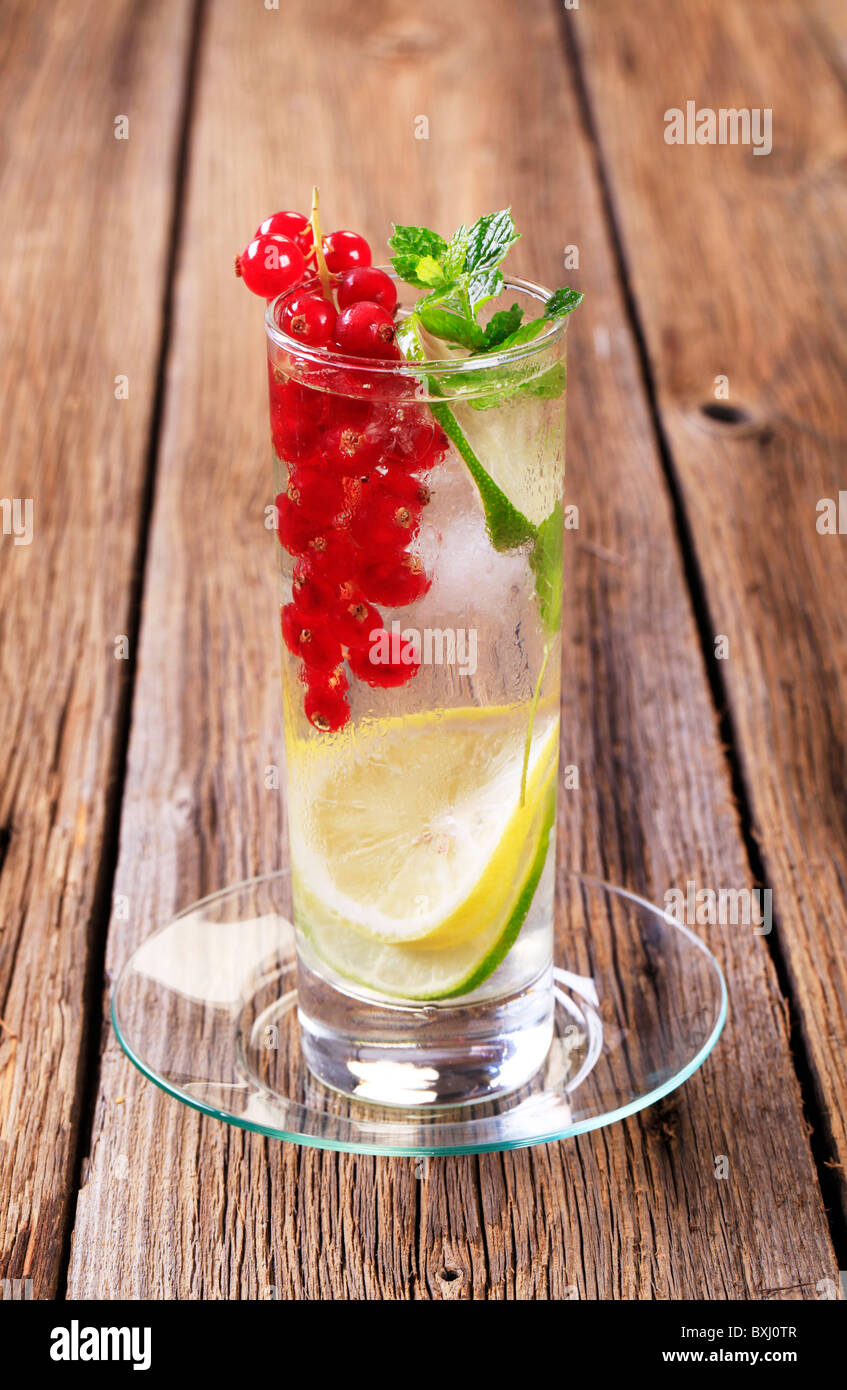 Glass of iced drink with fresh fruit Stock Photo - Alamy