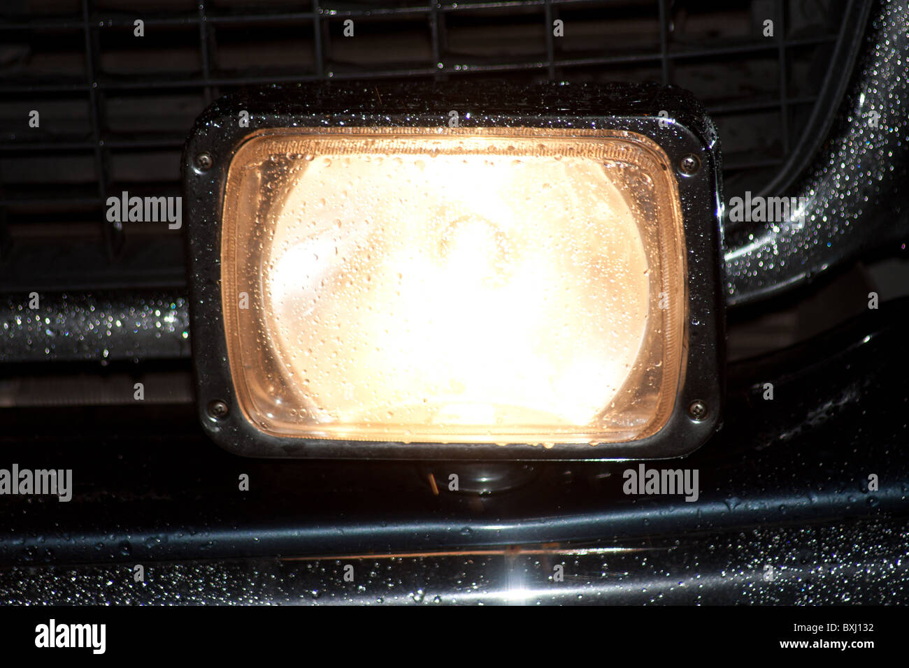 rain water night headlight car light vehicle front Stock Photo - Alamy