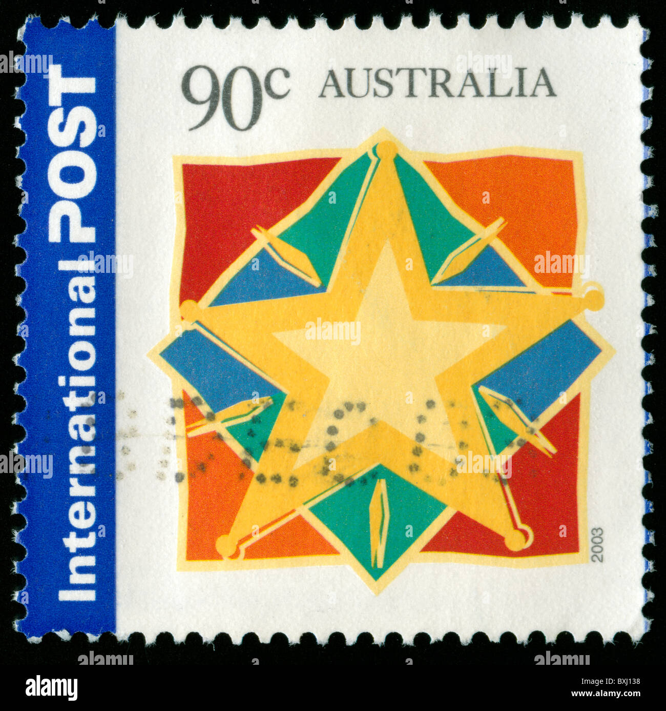 Christmas stamp from Australia with picture of a star Stock Photo - Alamy
