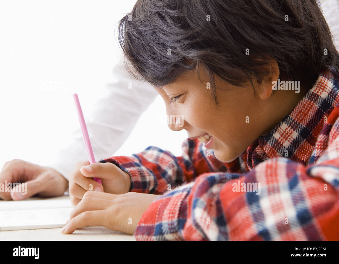 A boy studying Stock Photo - Alamy