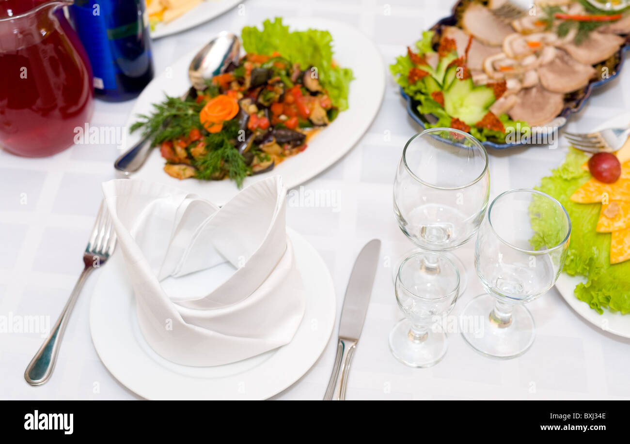 served dinner for one person at laid restaurant banquet table Stock ...