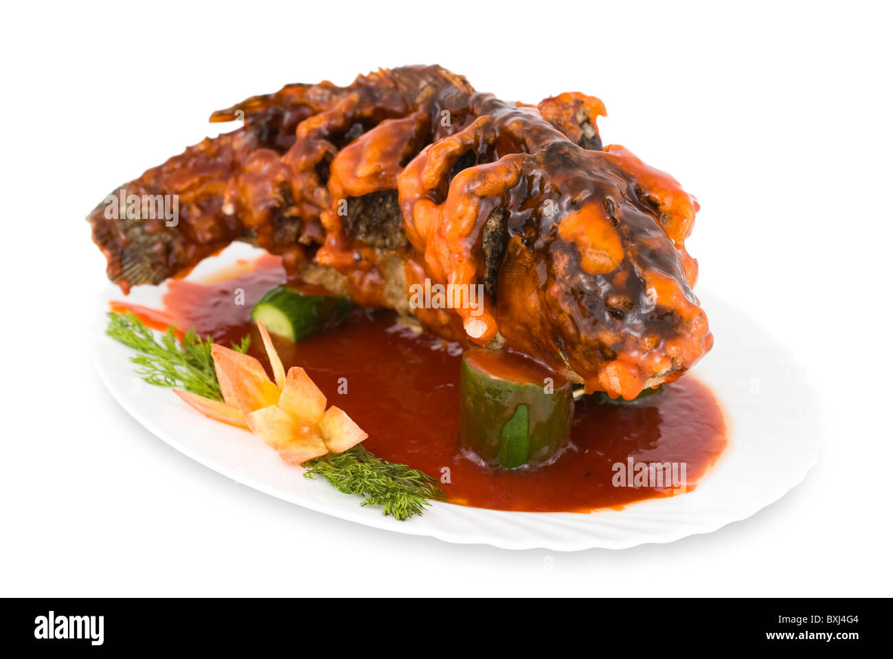 Chinese food. Carp rolled in starch and fried, with sour sweet sauce ...
