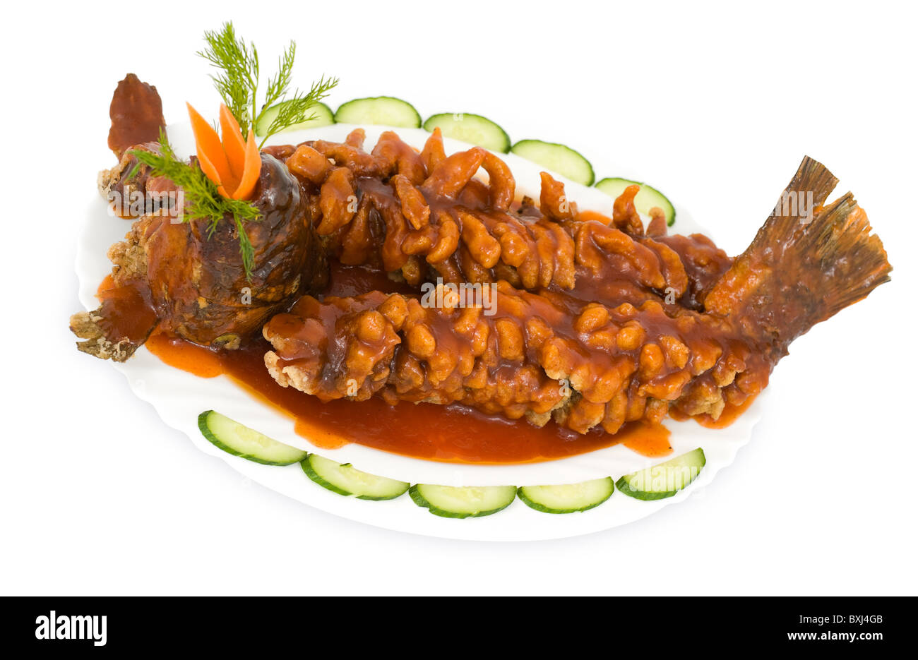 Chinese food. Deep fried carp in sour sweet sauce, previously rolled in ...