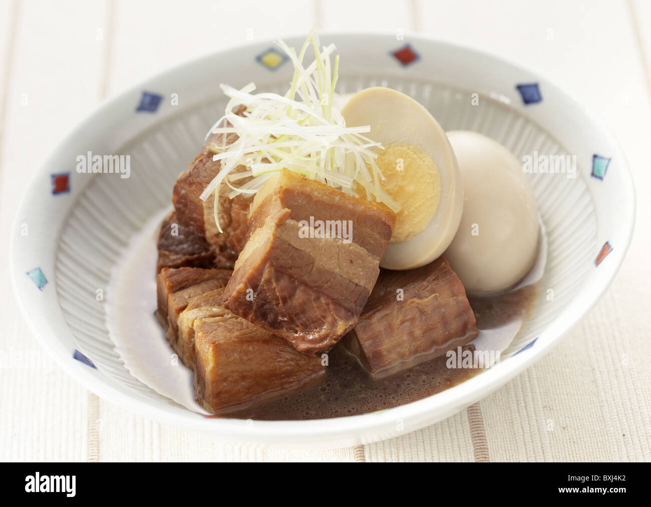 Pork simmered in soy sauce Stock Photo - Alamy