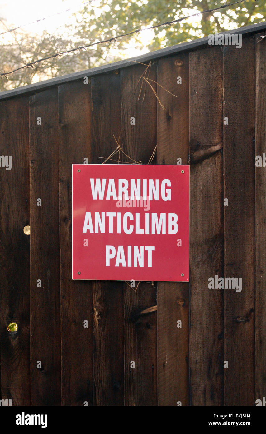 Anti-climb paint warning sign Stock Photo - Alamy