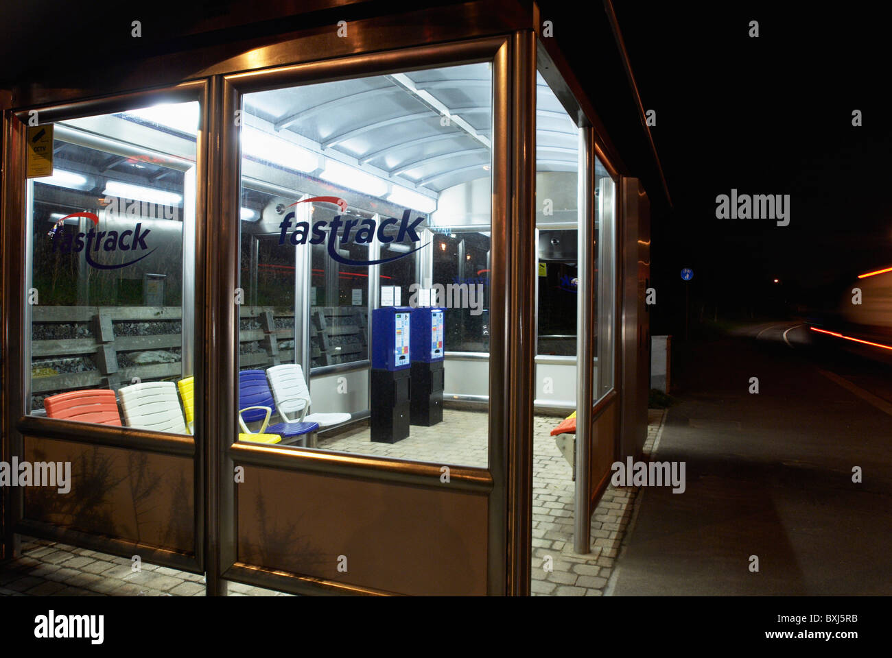 Ticket machines and waiting room at bus stop Kent UK night Stock Photo ...