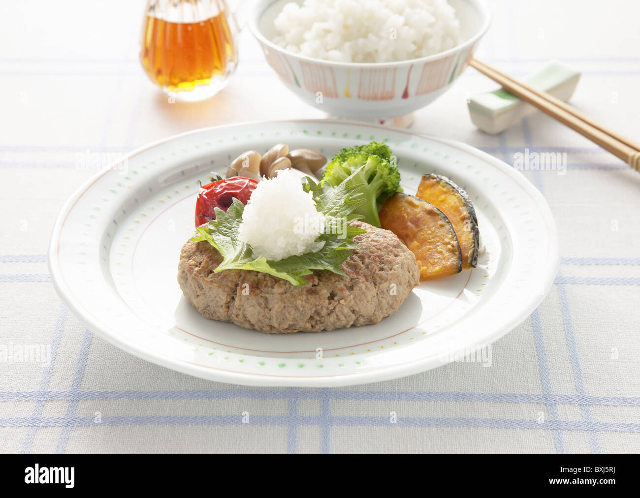 Hamburger steak with grated radish Stock Photo - Alamy