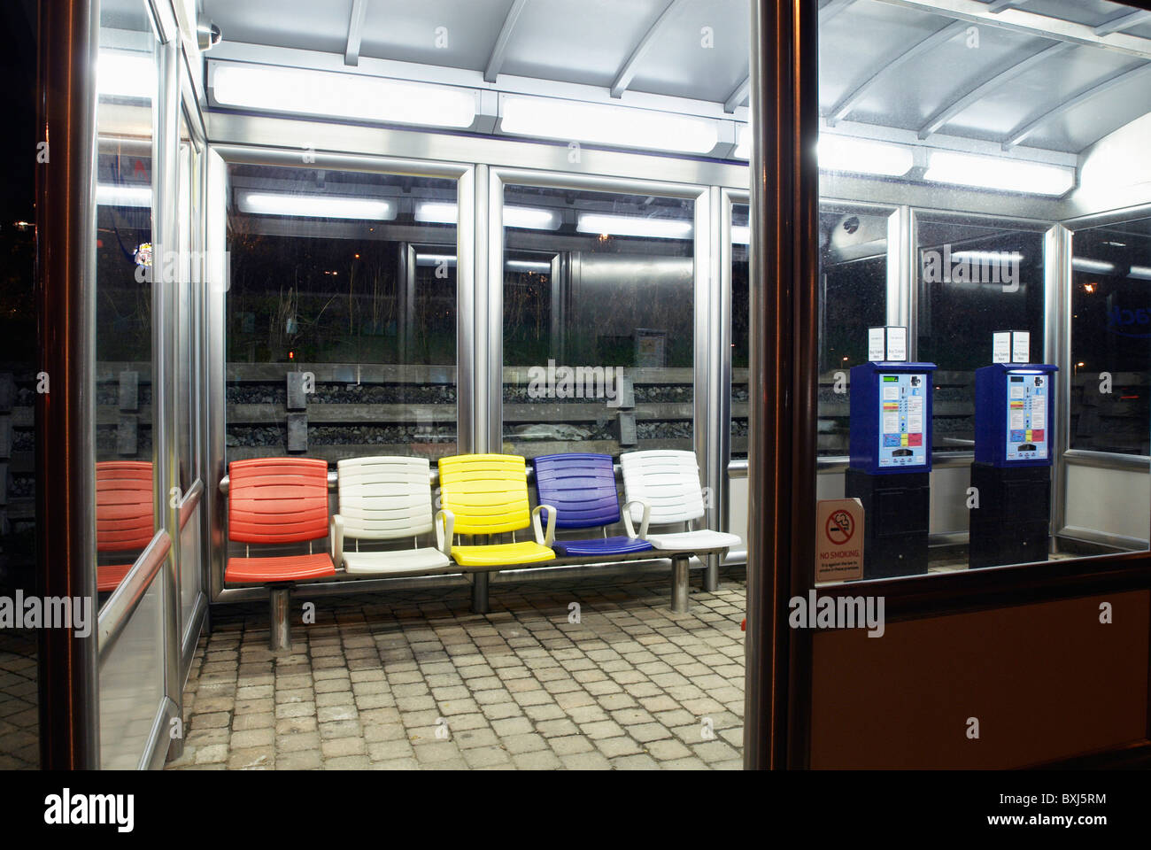Ticket machines and waiting room at bus stop Kent UK night Stock Photo ...