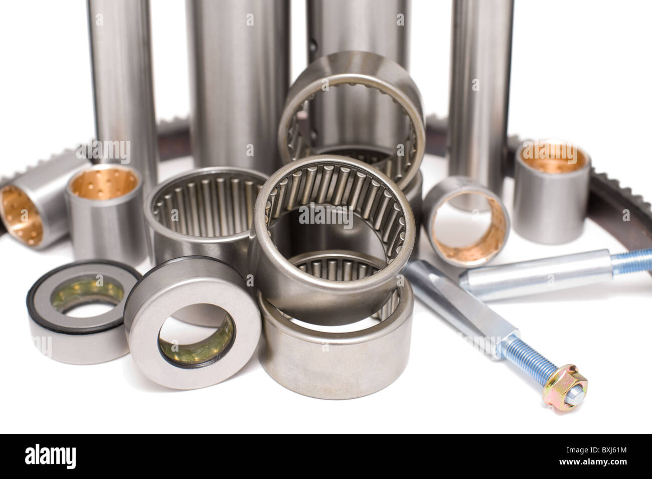 some auto spare parts against white background in shallow DOF Stock ...