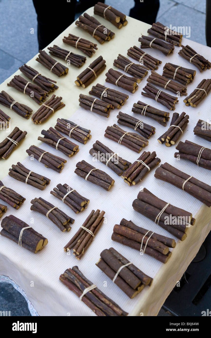 Table display of raw natural licorice sticks / liquorice stick for sale ...
