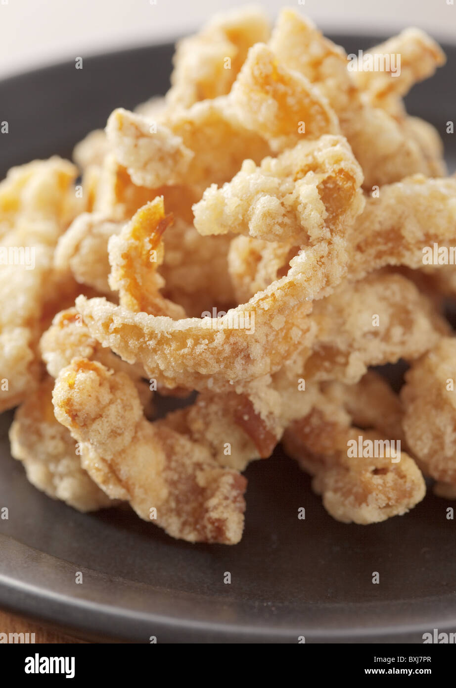 Fried chicken skin Stock Photo - Alamy