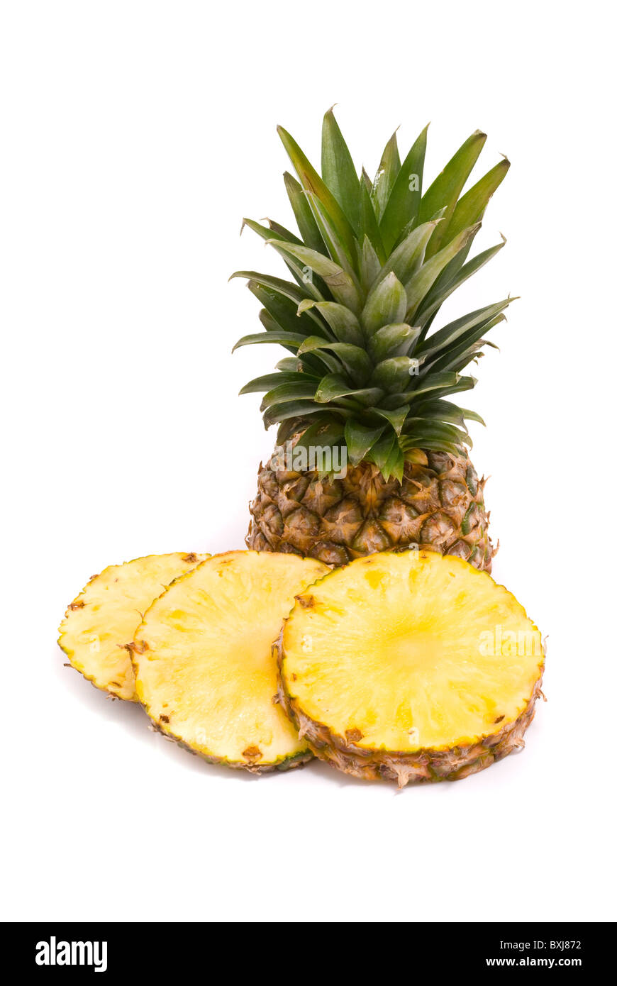 Sliced Pineapple on a white background Stock Photo - Alamy