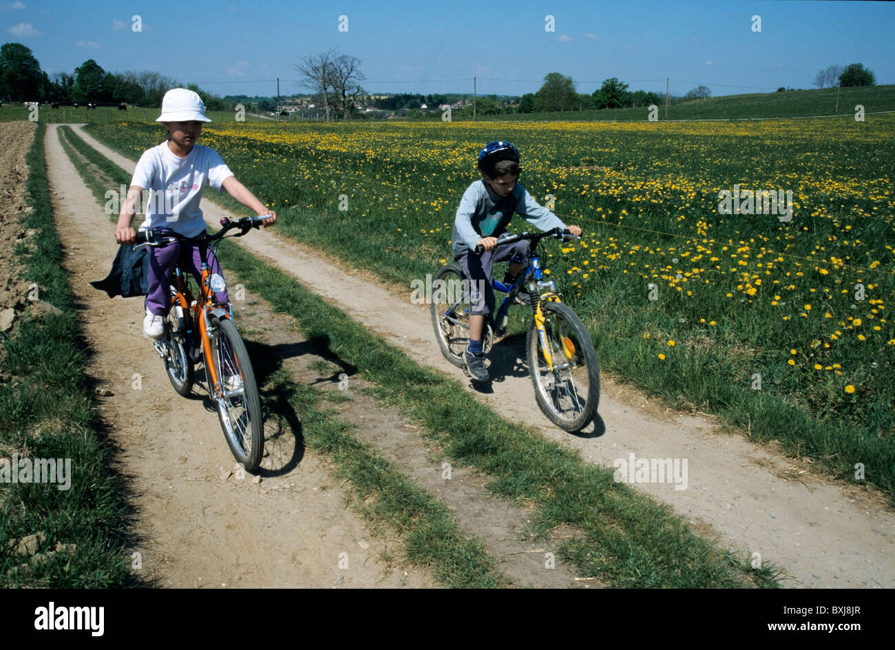 Two boys cycling on country hi-res stock photography and images - Alamy