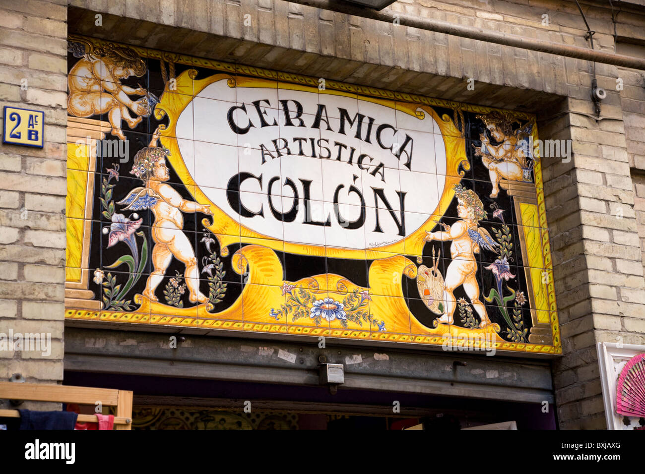 Terracotta / terra cotta tile / tiles forming sign on the front of a ...