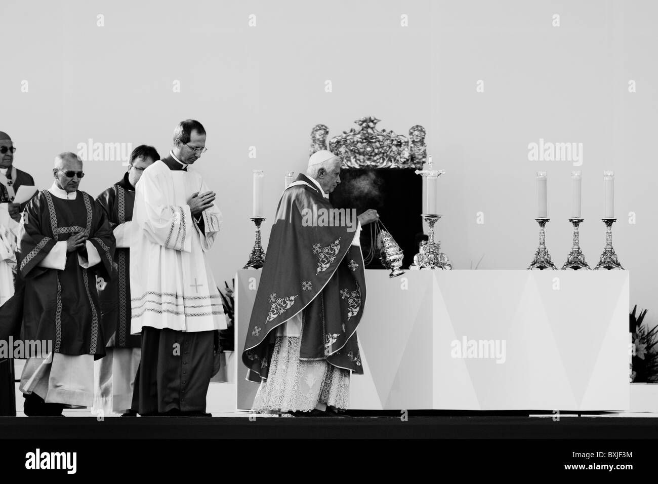 Pope Benedict XVI, holding a censer, celebrates the open-air mass in ...