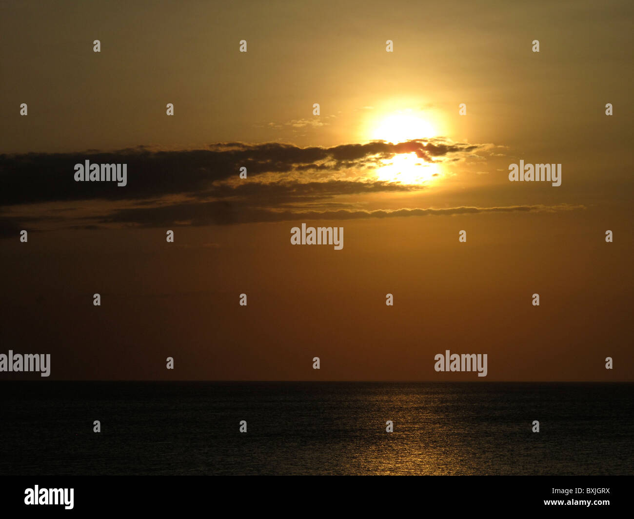 Sunset reflection over water hi-res stock photography and images - Alamy