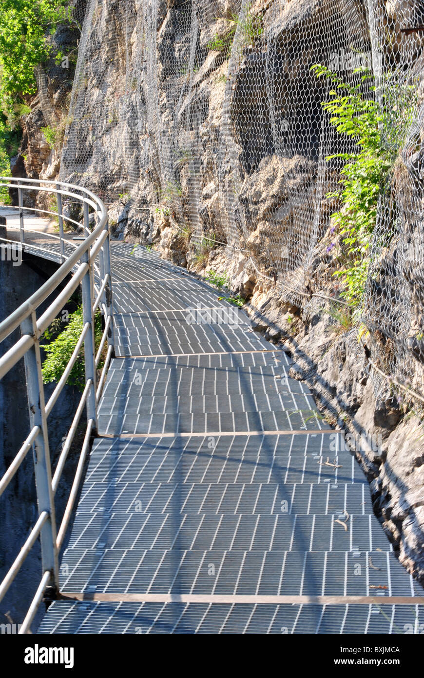 suspended walkway with metal safety net to walk and control Stock Photo ...
