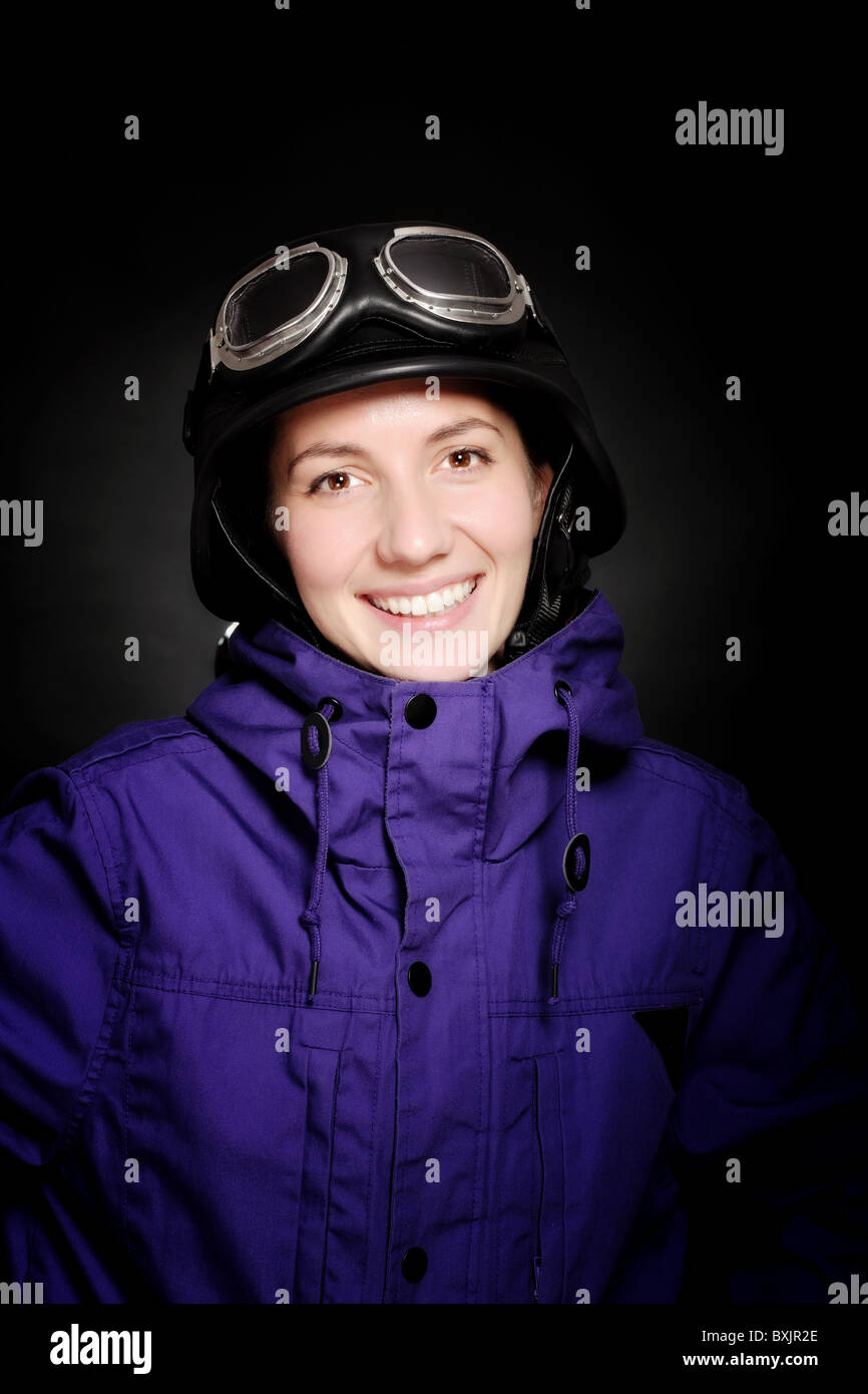 girl with us-army style helmet and goggles, on black Stock Photo - Alamy