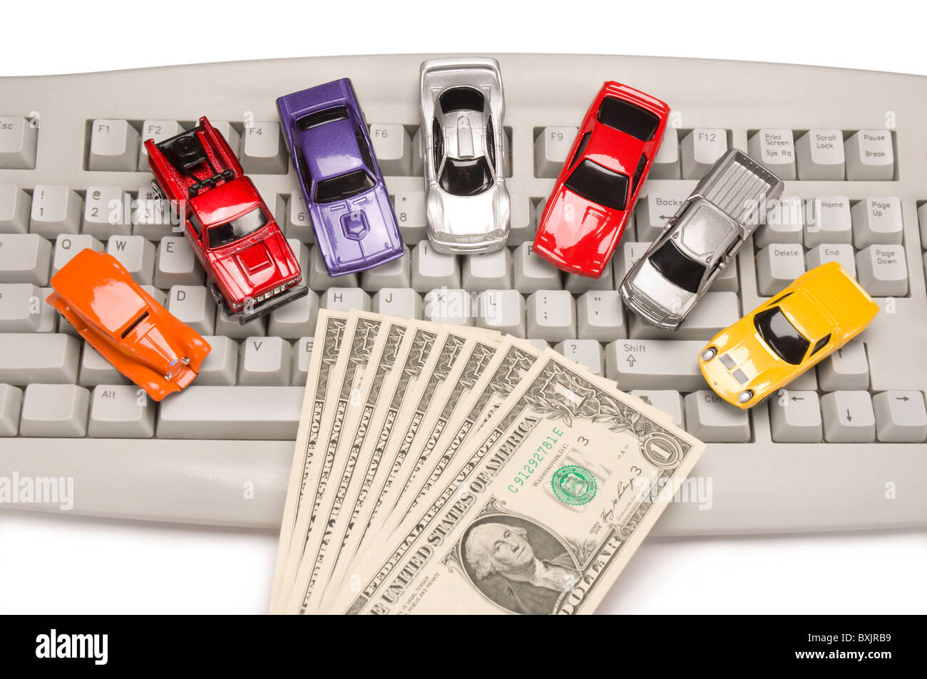Model cars on a computer keyboard Stock Photo - Alamy