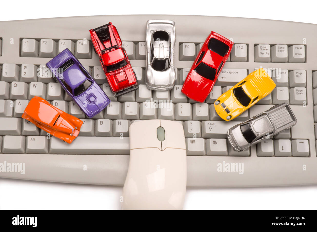 Model cars on a computer keyboard Stock Photo - Alamy