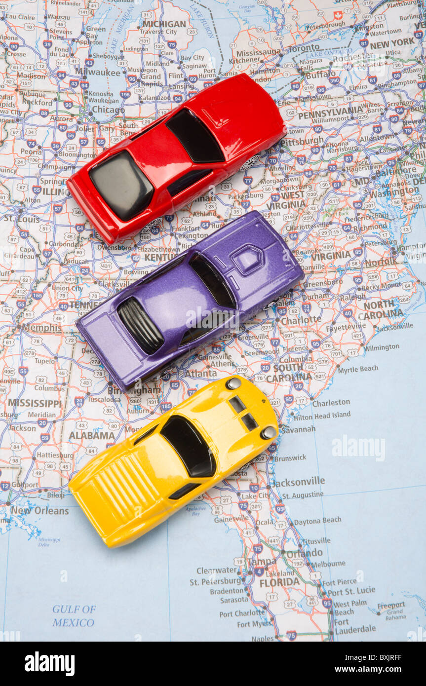 Cars driving across map Stock Photo - Alamy