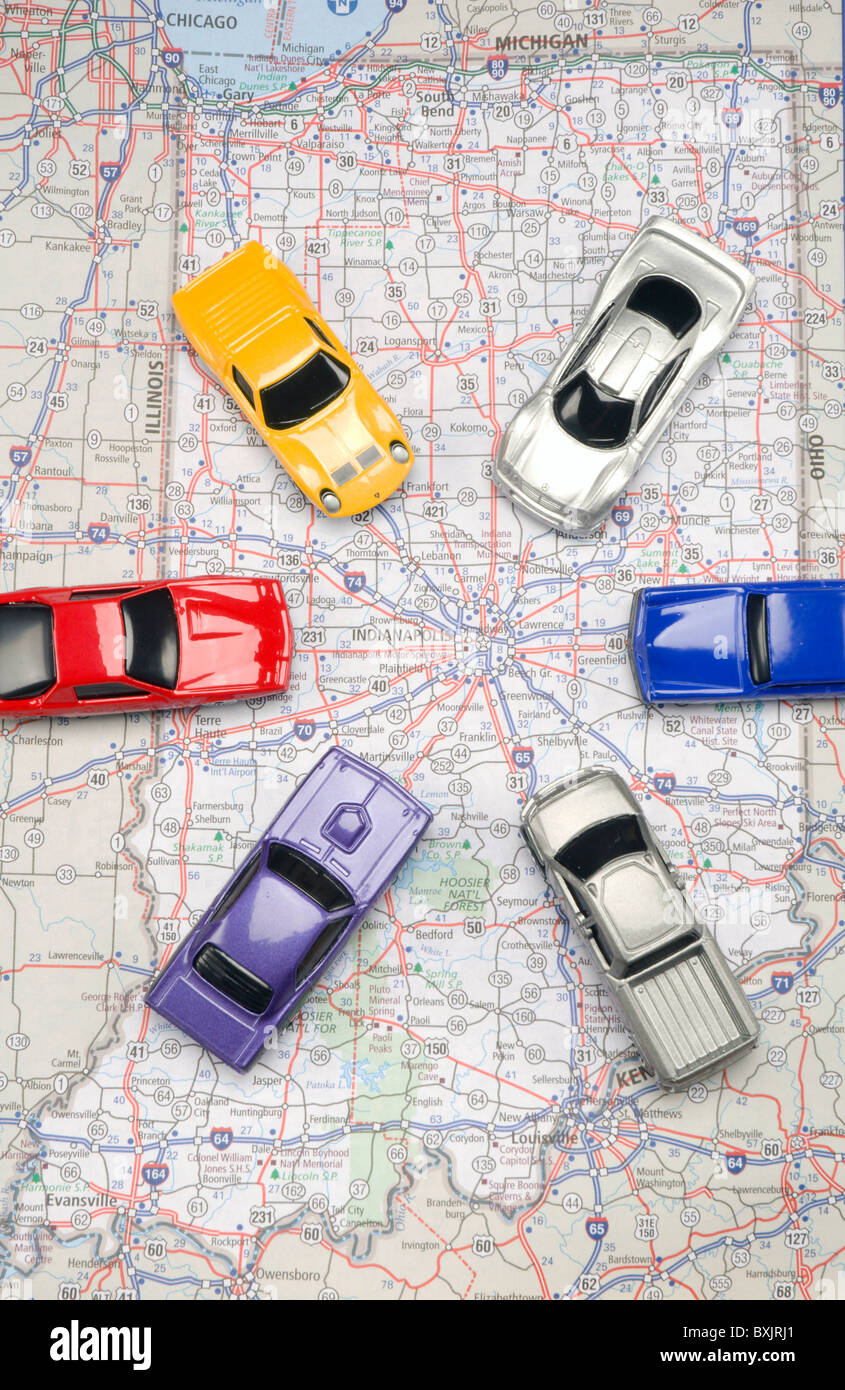 Cars driving across map Stock Photo - Alamy