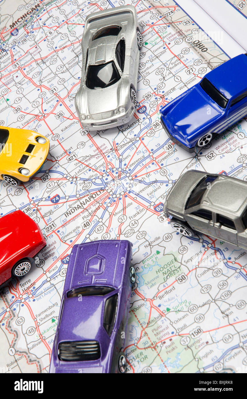 Cars driving across map Stock Photo - Alamy