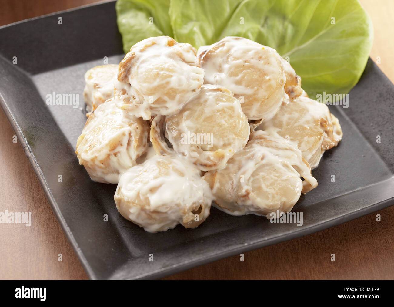 Scallops dressed with mayonnaise Stock Photo - Alamy