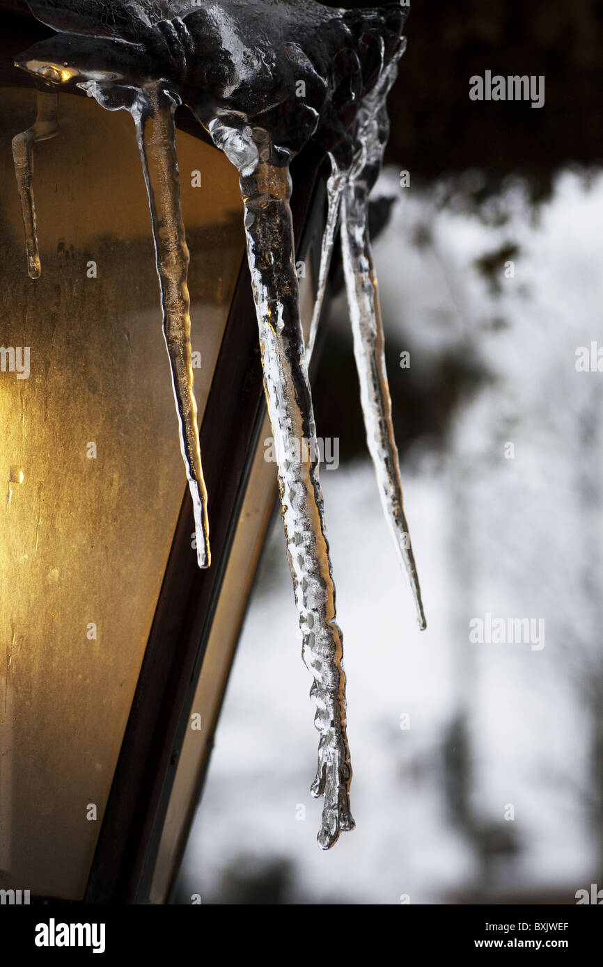 Icicles hanging from a building Stock Photo - Alamy