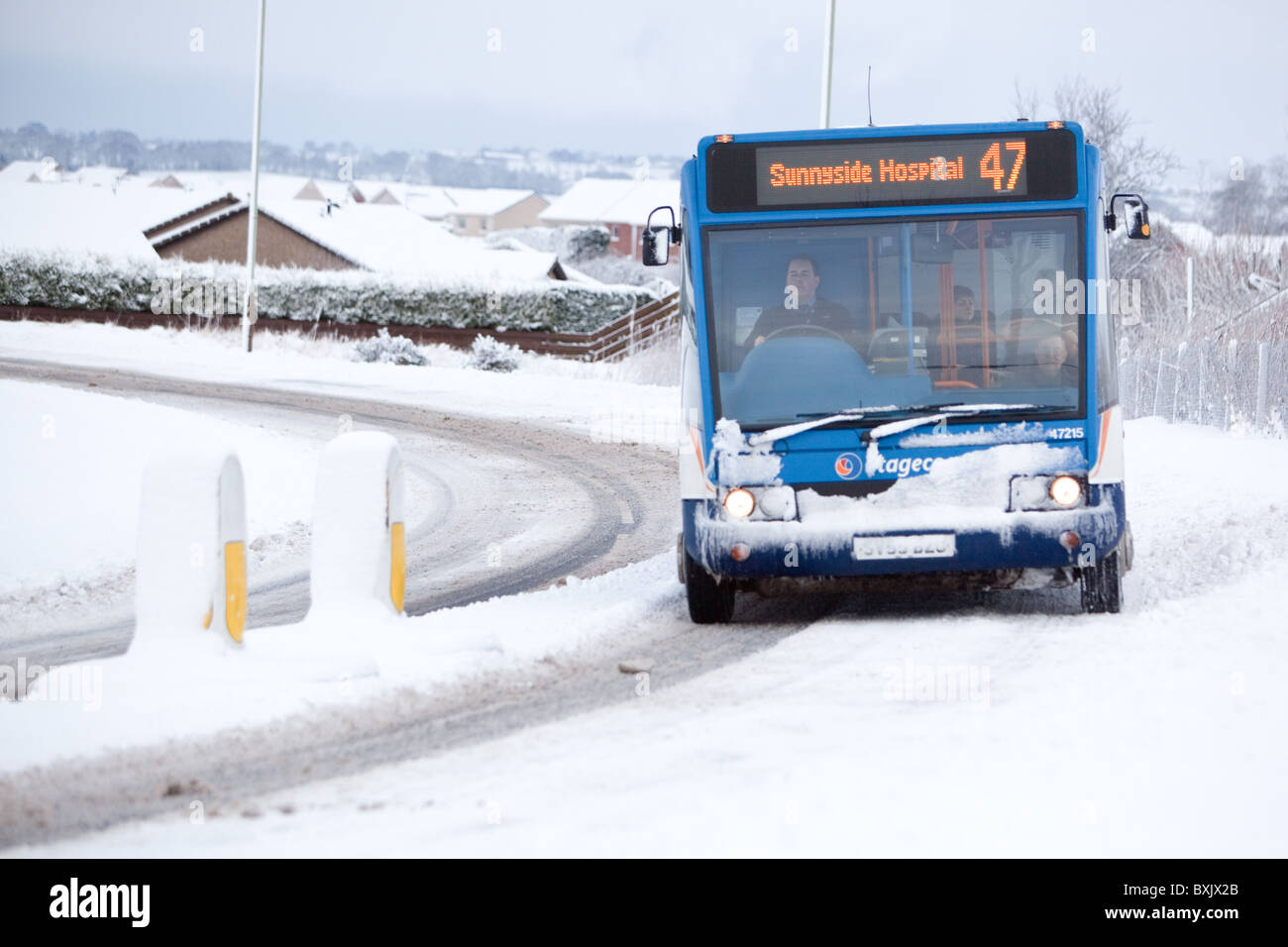 Local bus service to Hospital in winter snow Montrose Scotland Stock ...