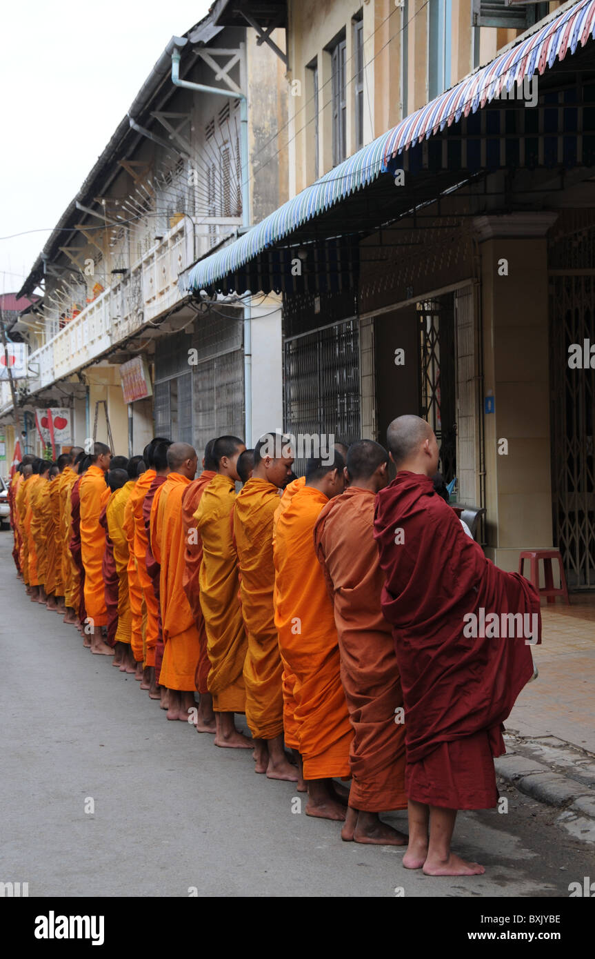 Buddhist monks walk begging hi-res stock photography and images - Alamy