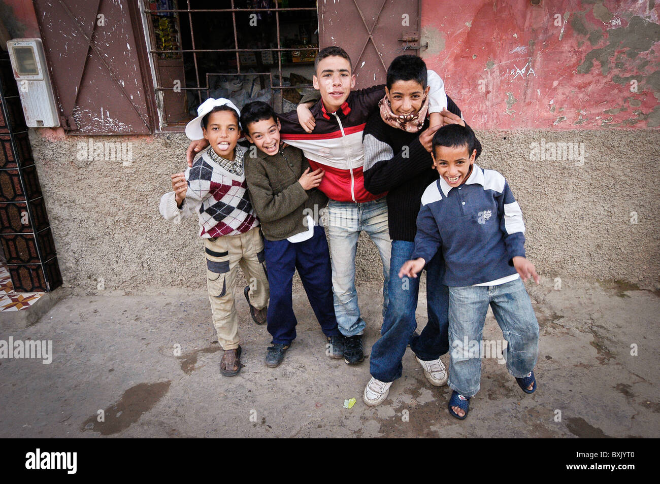 group of male children adolescents in Morocco slum Stock Photo - Alamy