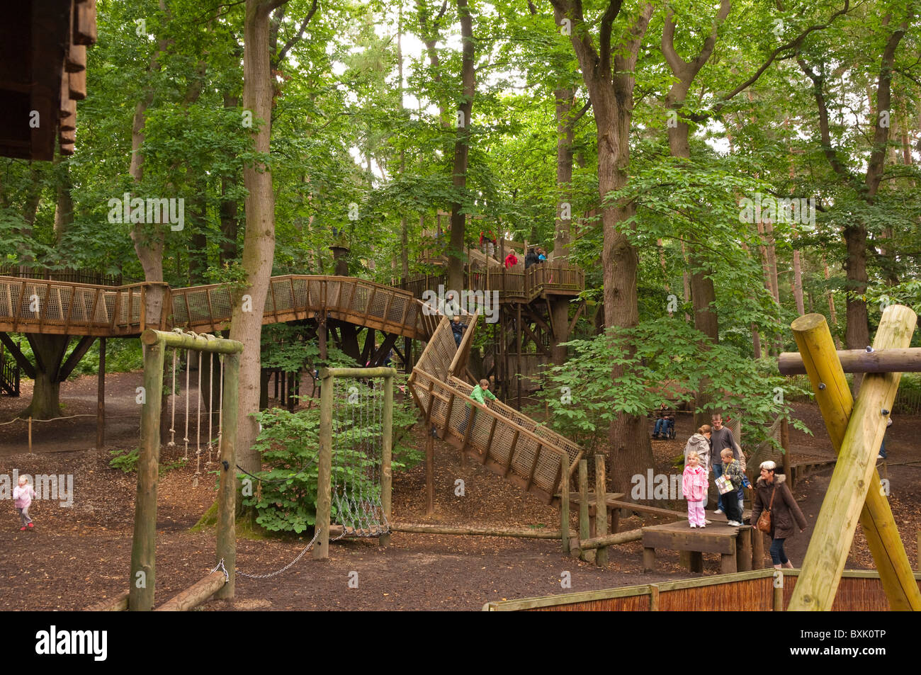 Visitors at Bewilderwood adventure park in Hoveton , Norfolk , England ...