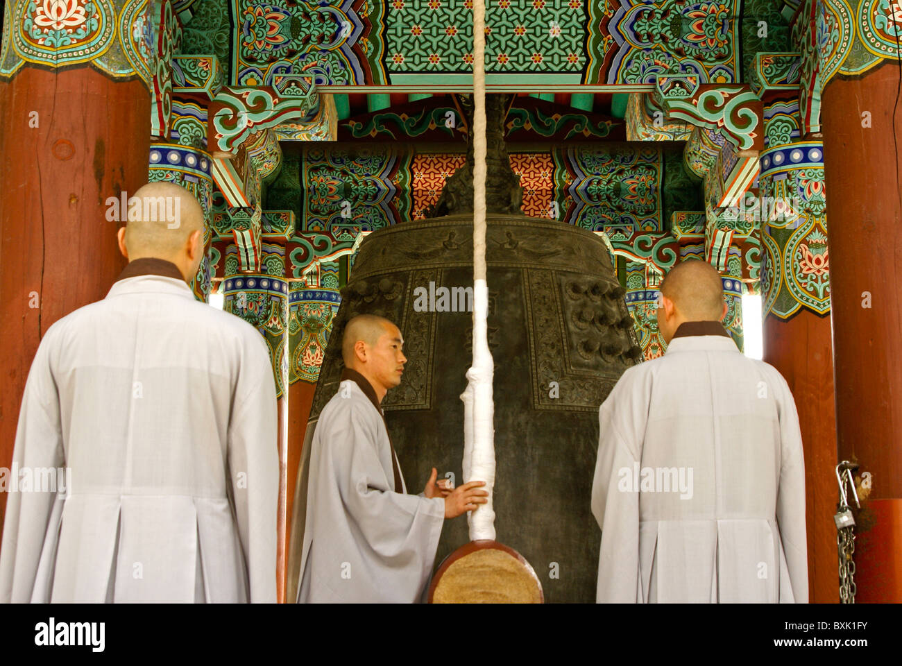 Buddhist monks ringing large bell, Haeinsa temple, South Korea Stock ...