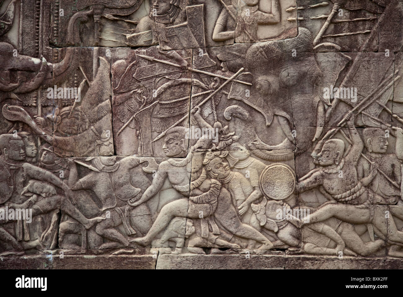 Stone-carved bas relief at Angkor. Photo V.D Stock Photo - Alamy