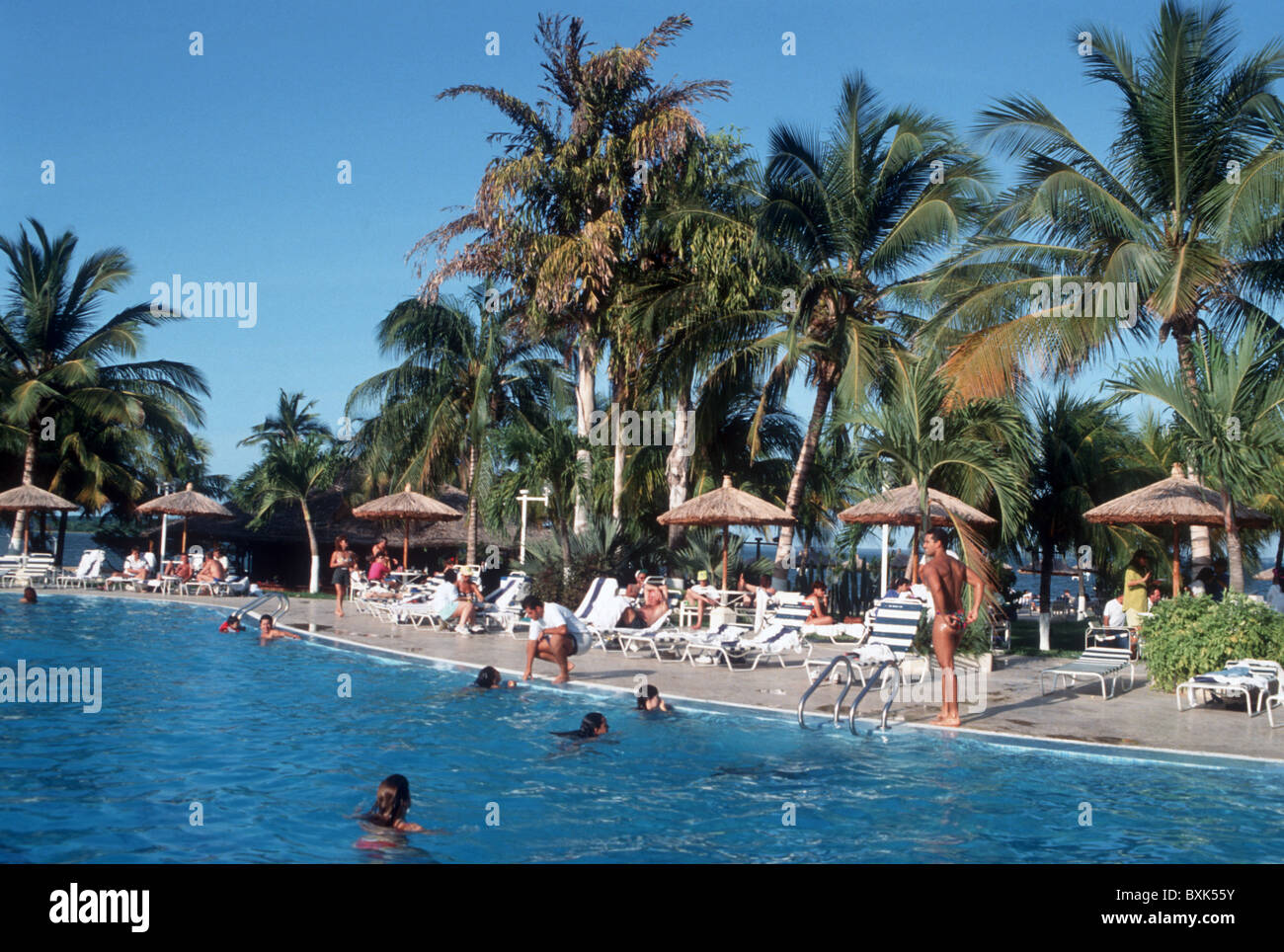 VENEZUELA. TOURISTS IN A HOTEL SWIMMING POOL IN MARACAIBO Stock Photo ...