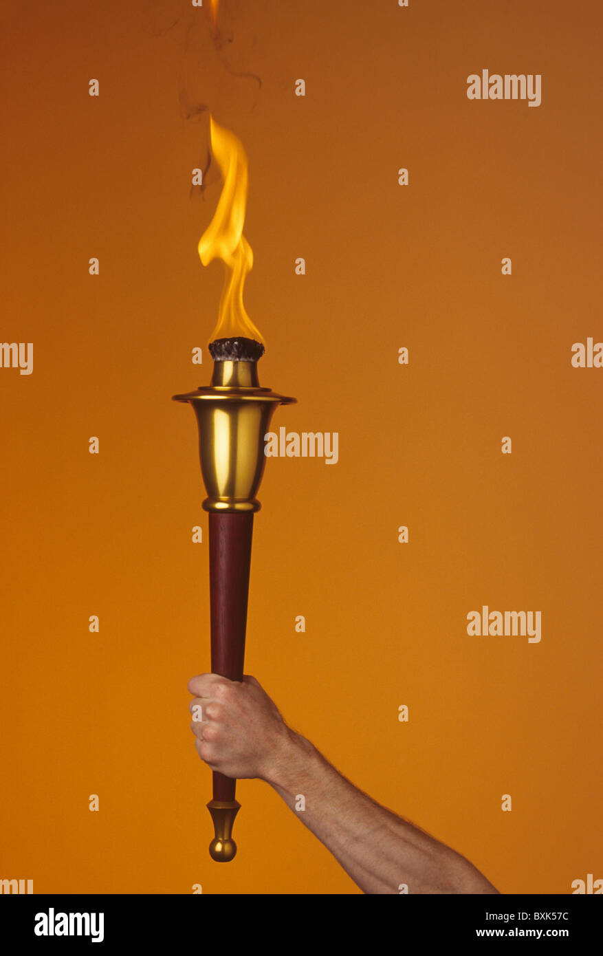 Holding the olympic torch hi-res stock photography and images - Alamy