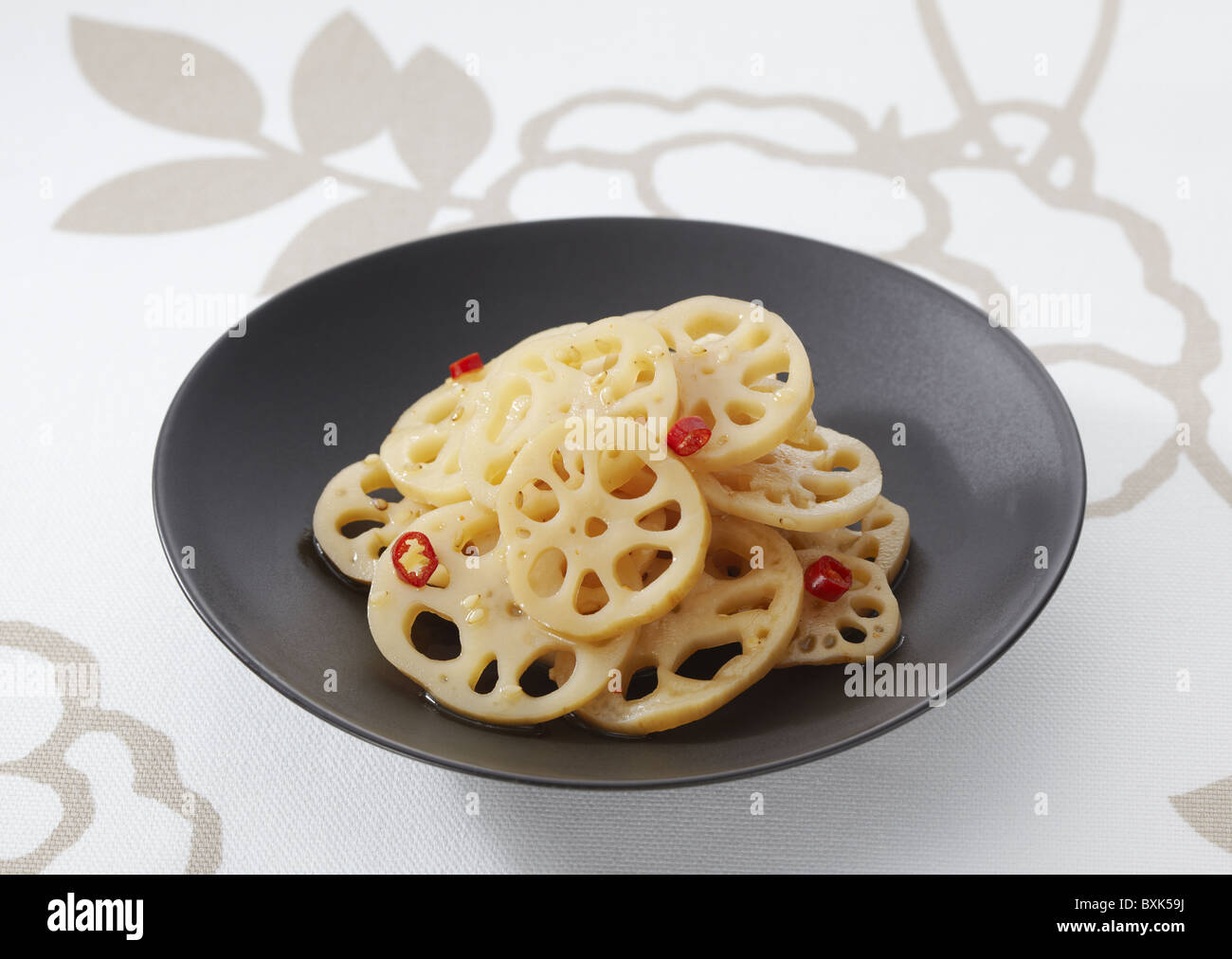 Lotus root kinpira Stock Photo - Alamy