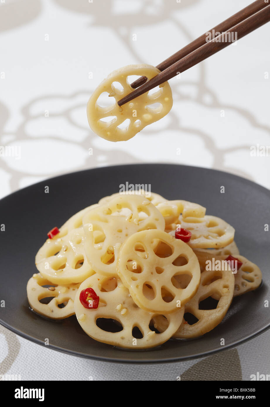 Lotus root kinpira Stock Photo - Alamy