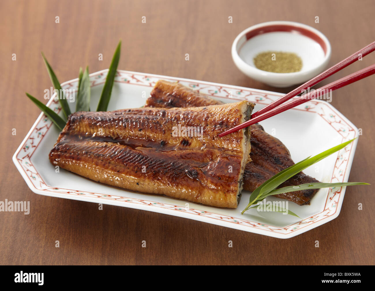 Broiled eel dipped in a sweet soy sauce-base sauce Stock Photo - Alamy