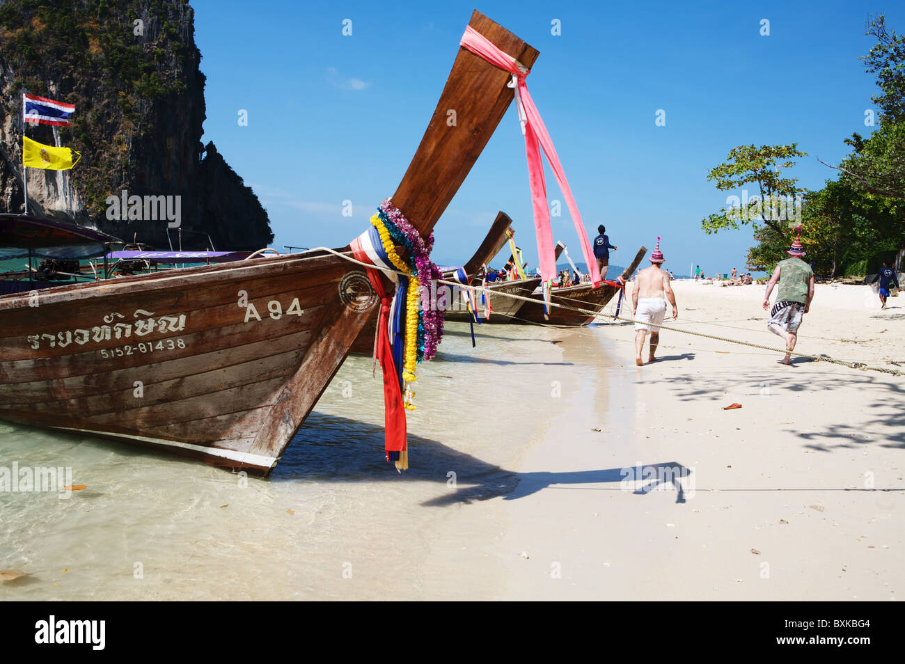 Traditional Thai Long Tail Boats on Phra Nang Beach Stock Photo - Alamy